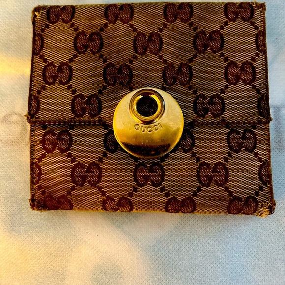 Gucci | Bags | Authentic Gucci Cream Mono Canvas Compact Bifold Wallet ...